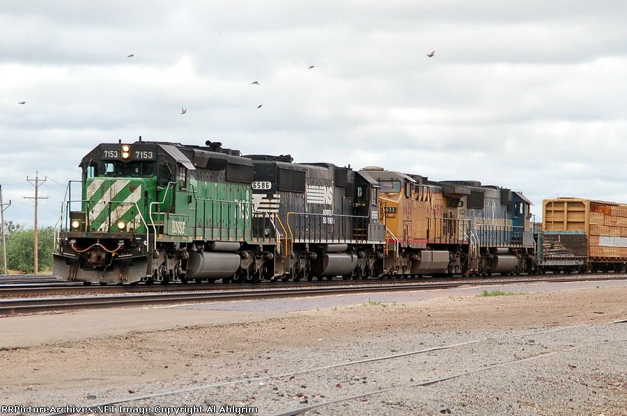BNSF 7153, NS 6586, UP 6633, EMDX 9018